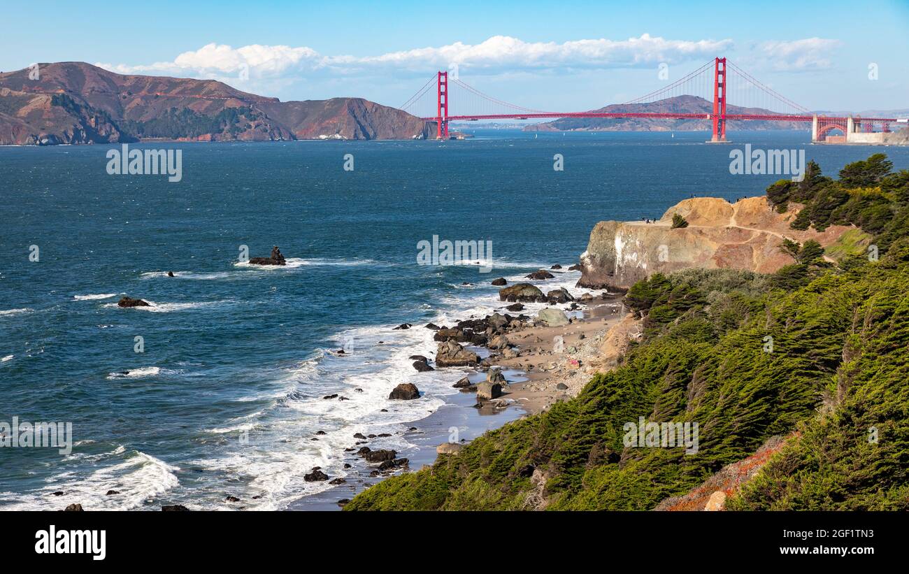 Landscape of Golden Gate bridge over sea horizon from Baker beach, San ...