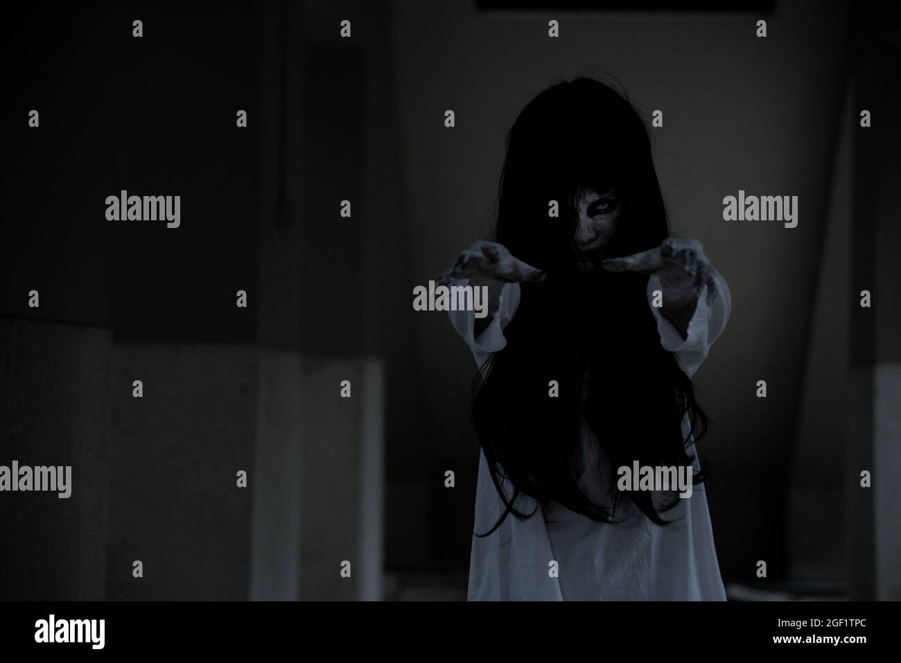 Horror woman ghost creepy standing show 2 hands at the house, halloween ...
