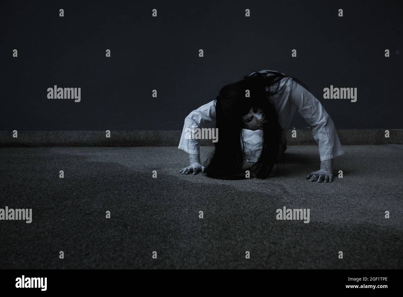 Woman crawling creepy hi-res stock photography and images - Alamy
