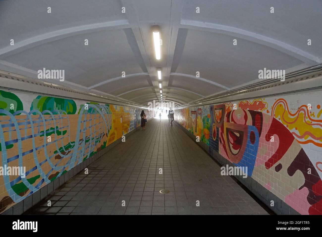 Pedestrian tunnel with fake graffiti along the Riverside area of ...