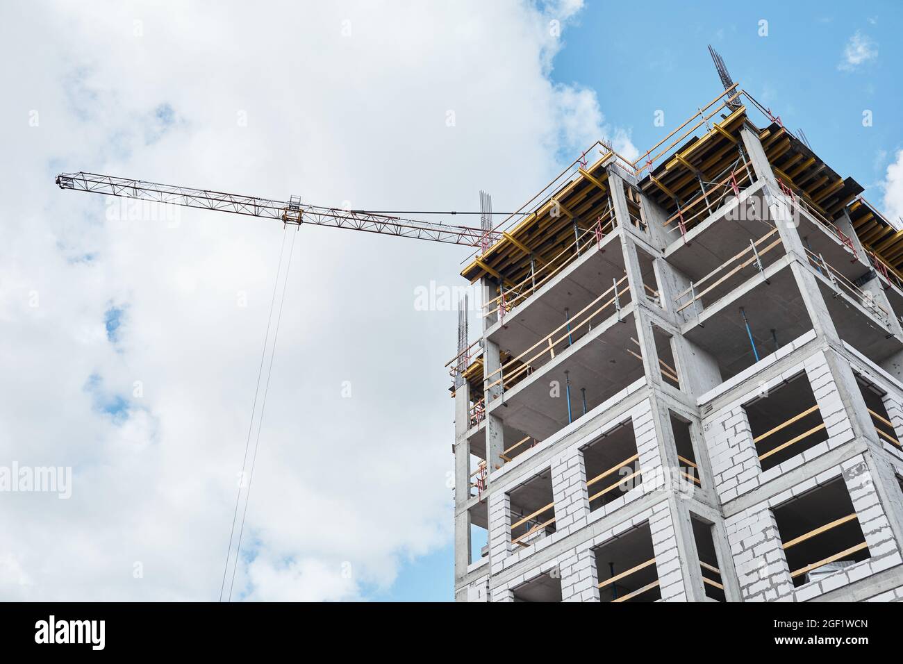 Low angle shot of residential building under construction with brick ...