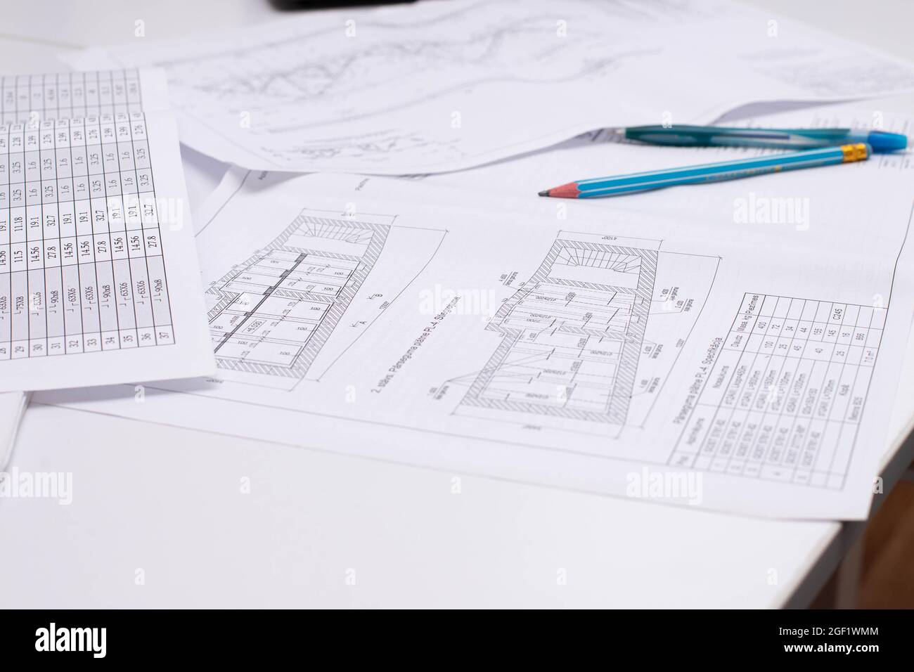 drawings of a construction engineer on a sheet of paper Stock Photo - Alamy