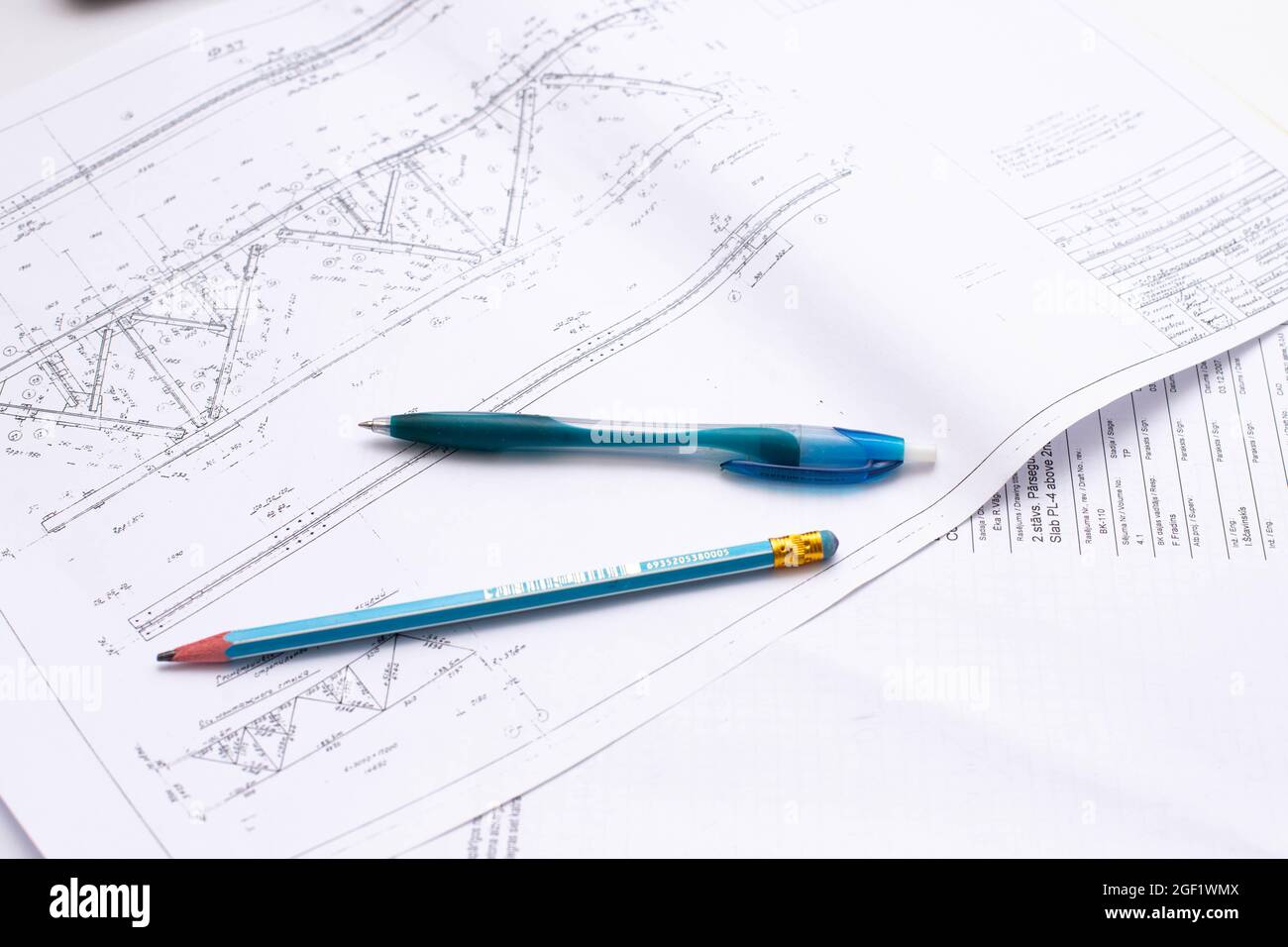 drawings of a construction engineer on a sheet of paper Stock Photo - Alamy