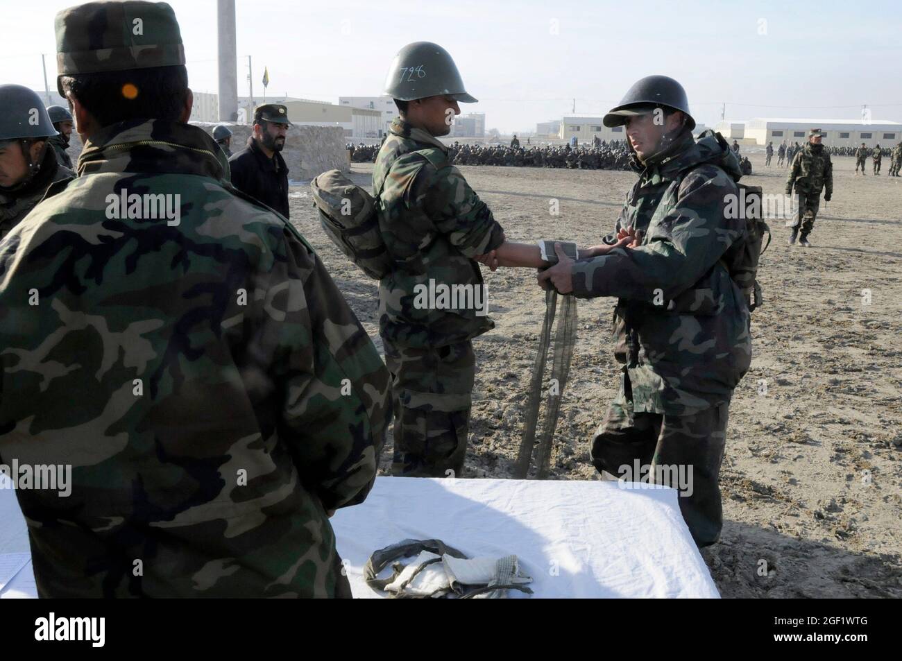 Kabul - Afghan National Army trainees demonstrate their self-aid buddy ...