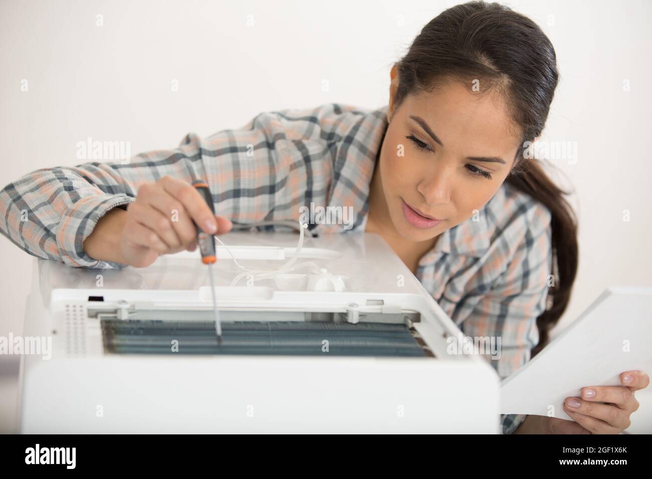 Woman printer home hi-res stock photography and images - Alamy