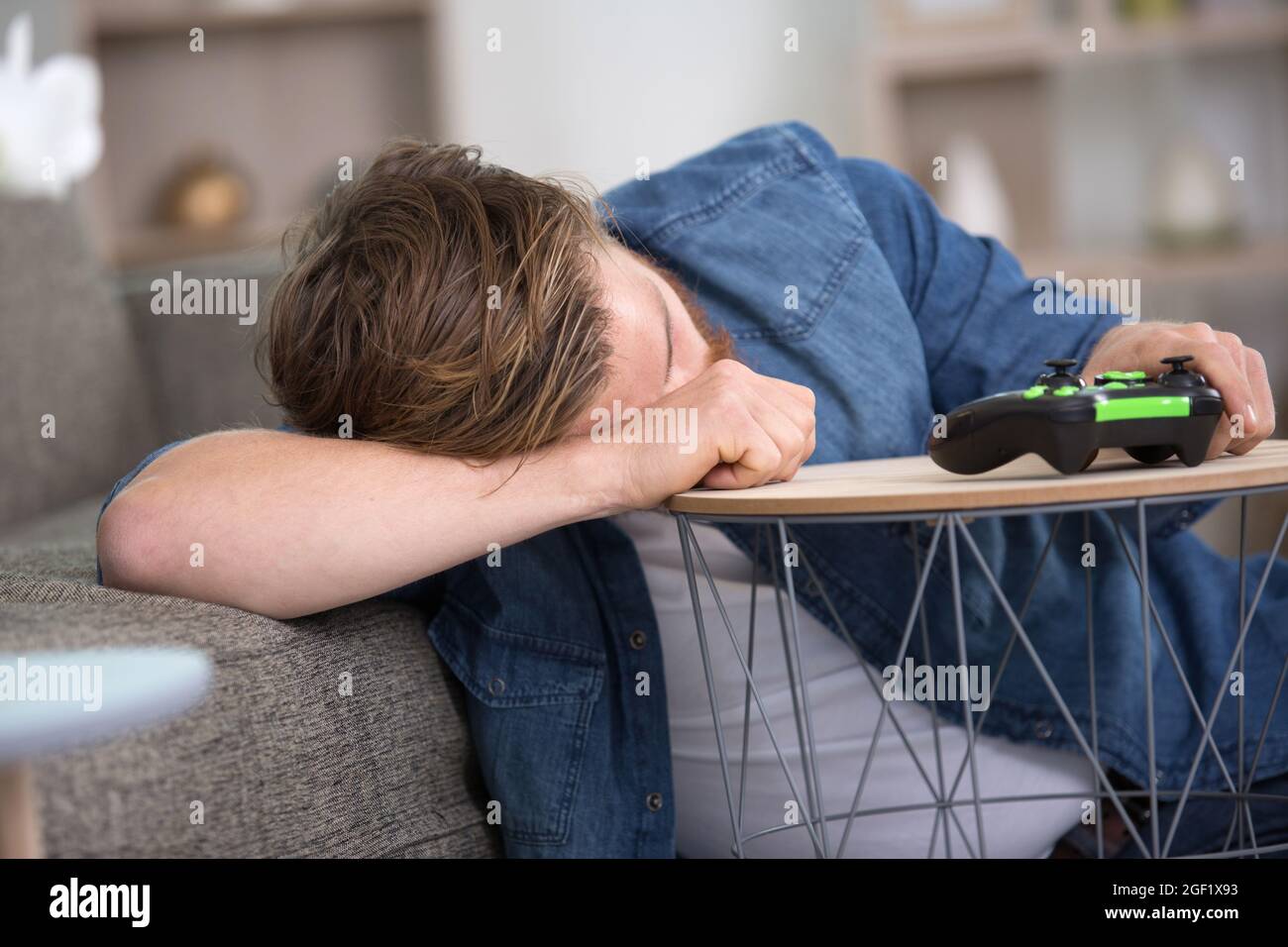 young man played video games all night Stock Photo - Alamy