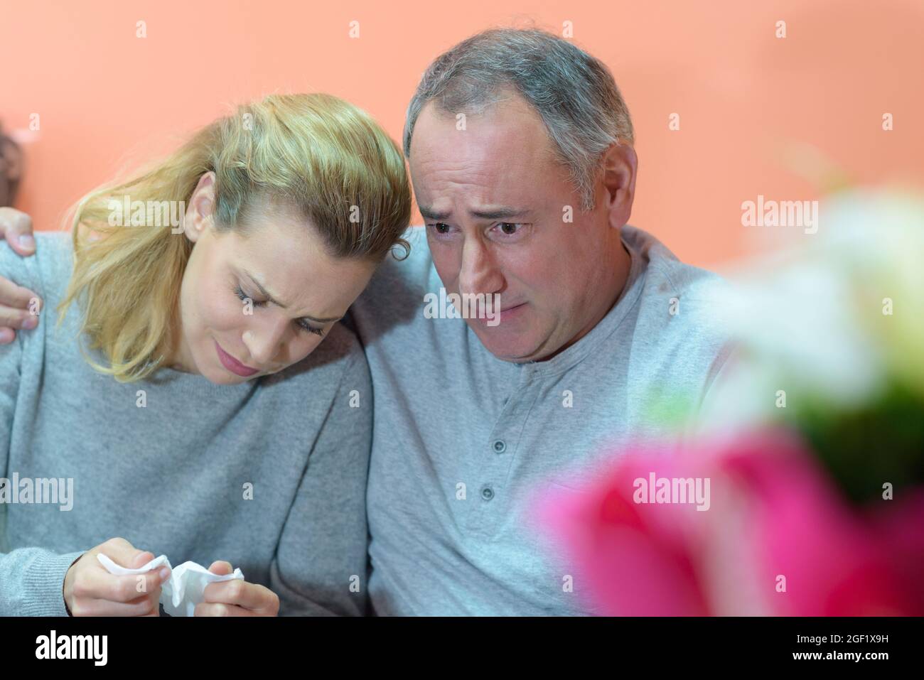 worried sad couple Stock Photo - Alamy