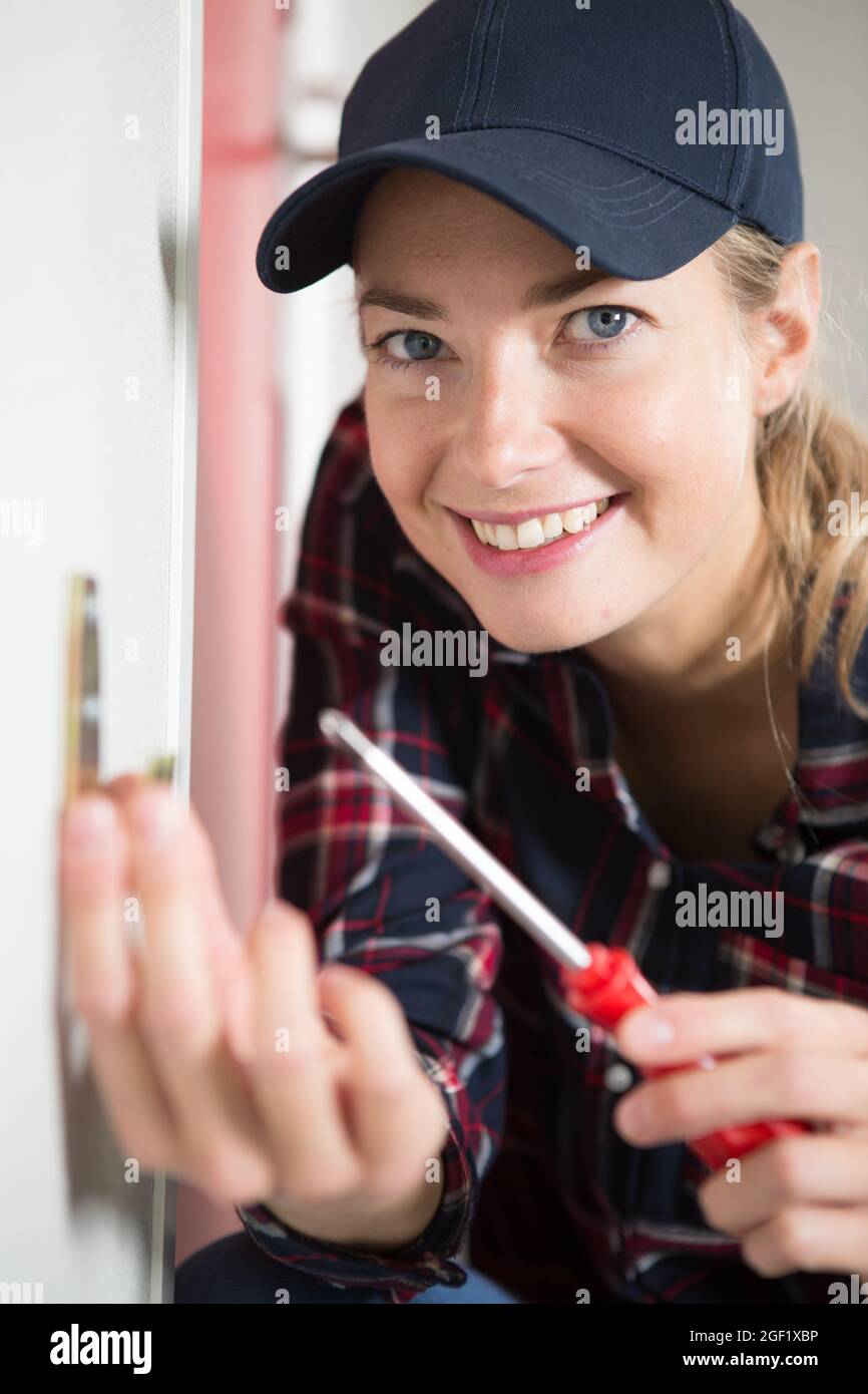 close-up the woman holding the screwdriver Stock Photo - Alamy