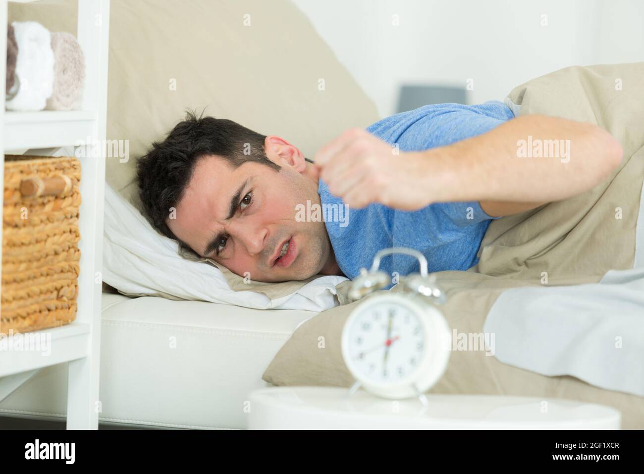 Alarm clock ringing angry hi-res stock photography and images - Alamy