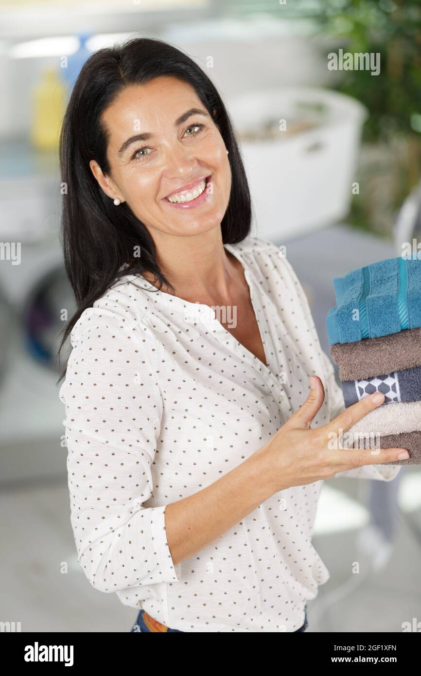 Woman wrapped cotton towel hi-res stock photography and images - Alamy