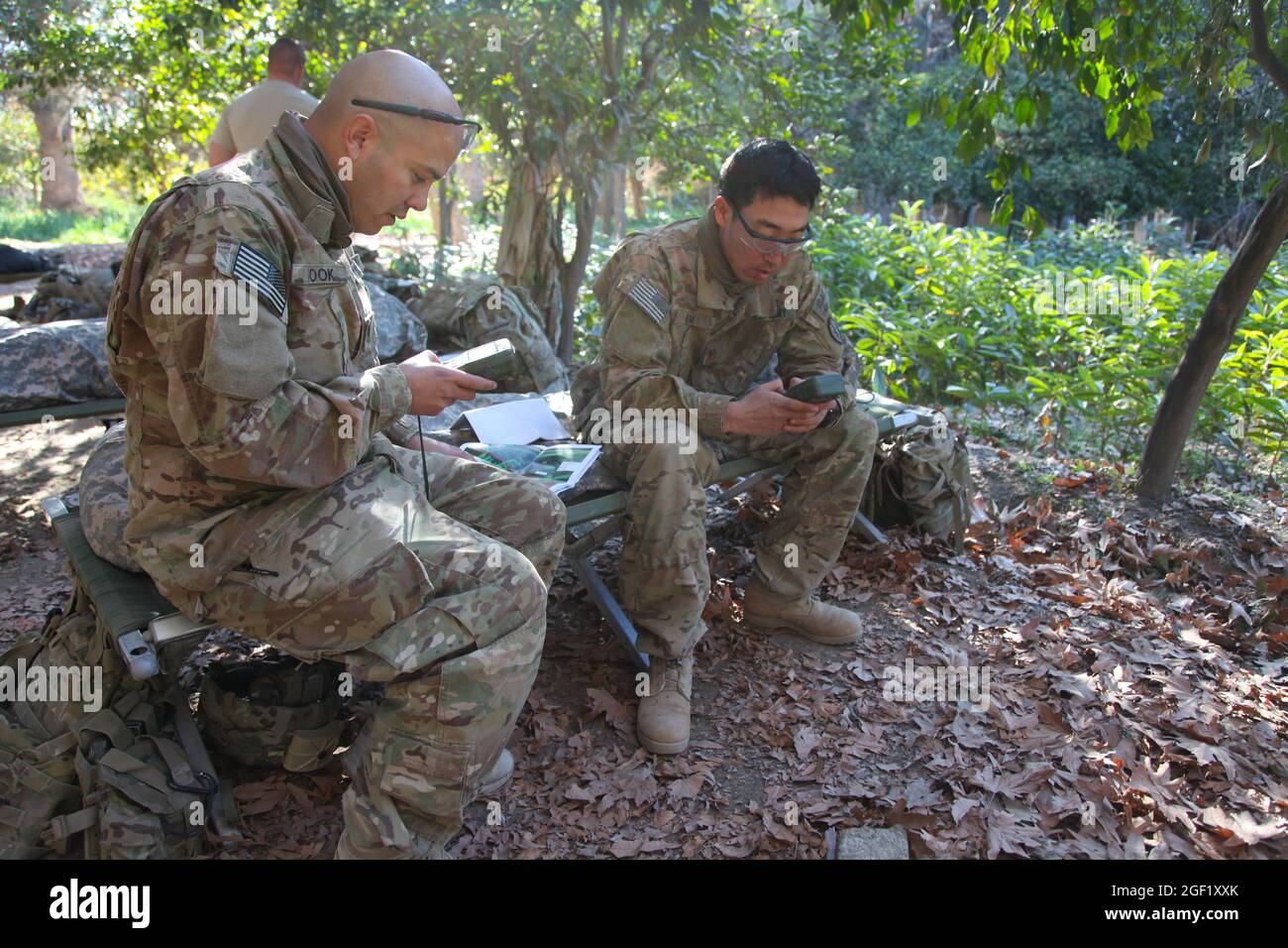 U.S. Army Staff Sgt. Eric Cook (left) and Staff Sgt. Sean Im (right ...