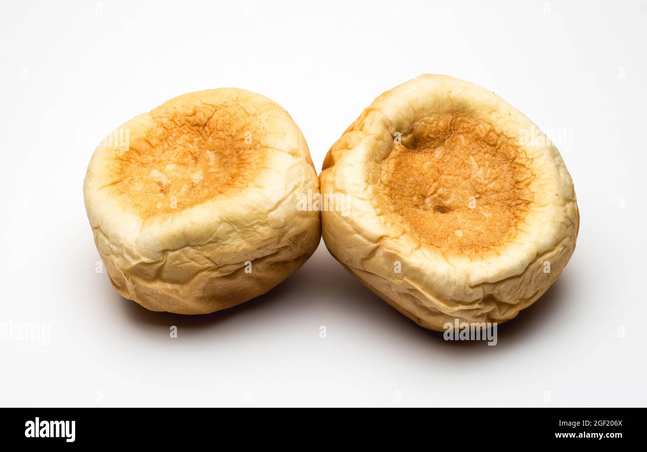 Two upside down hamburger buns on white background close up Stock Photo ...