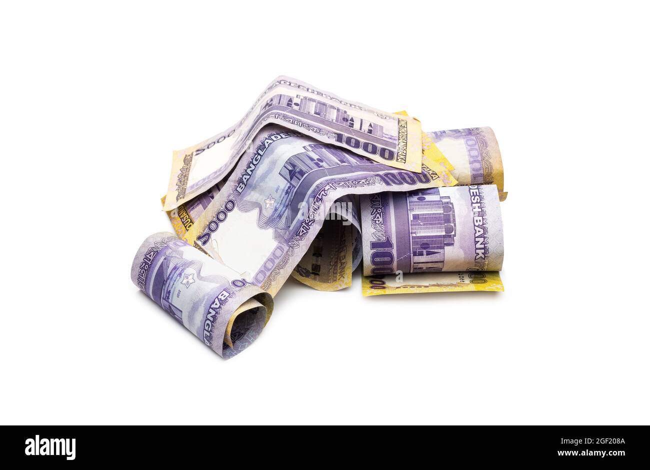 A pile of scattered rolled thousand taka bangladesh banknotes on an ...