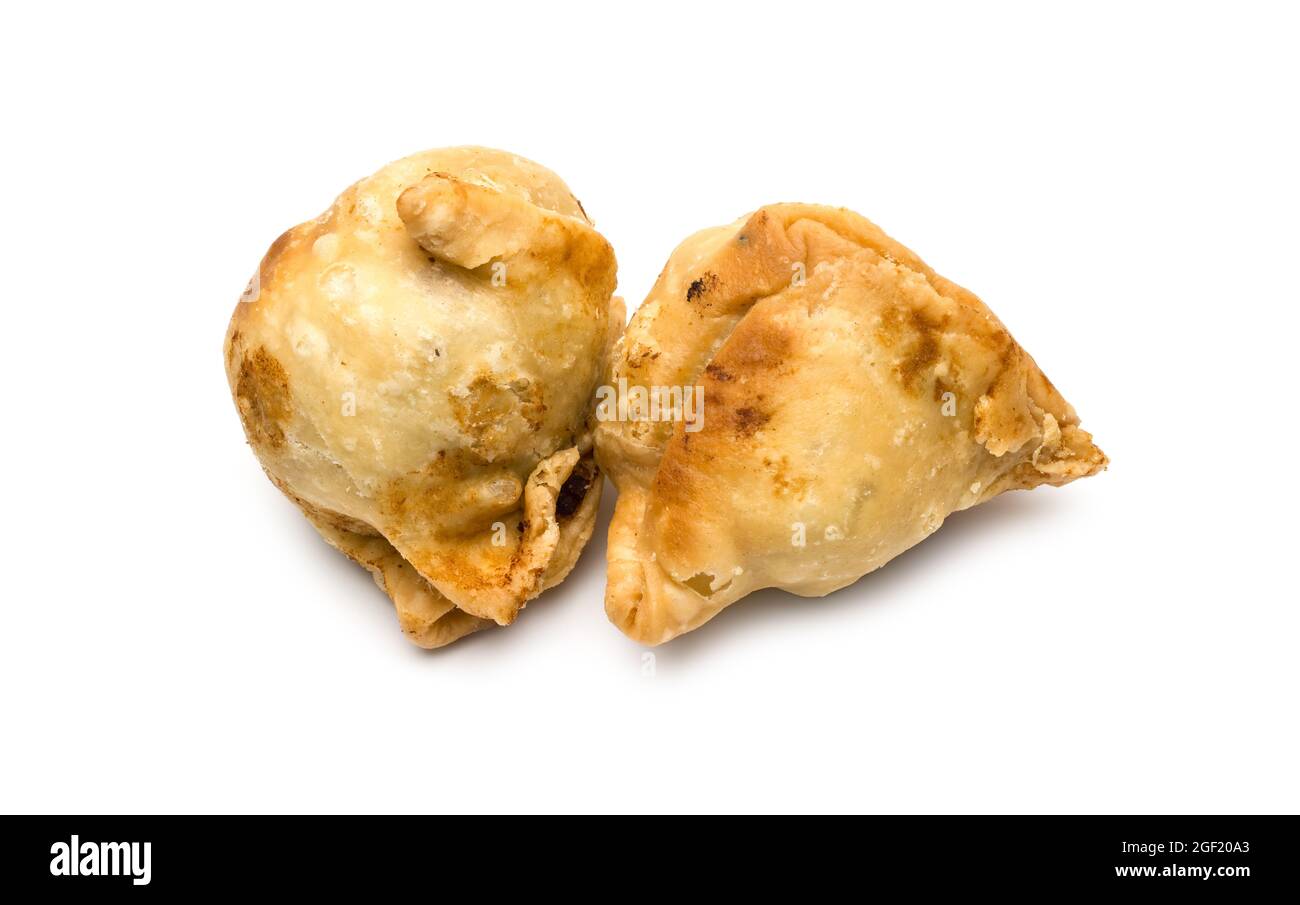 Homemade roasted samosas on an isolated white background Stock Photo ...
