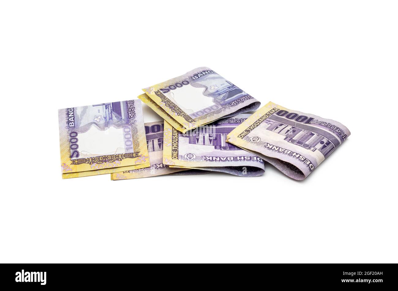 Scattered thousand taka bangladesh banknotes on an isolated white ...