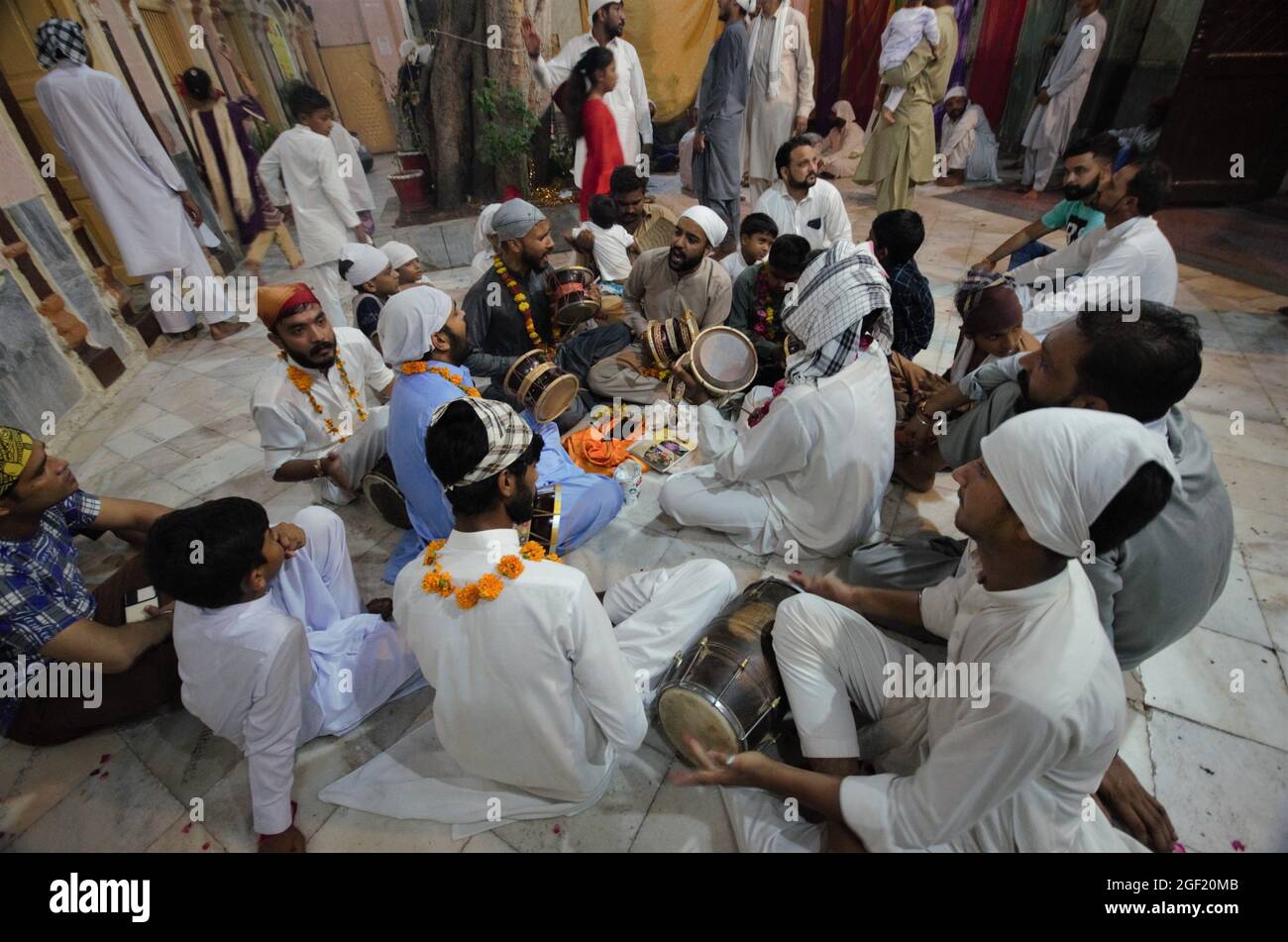 Pakistani Hindus pray in the temple during the celebration of Raksha ...