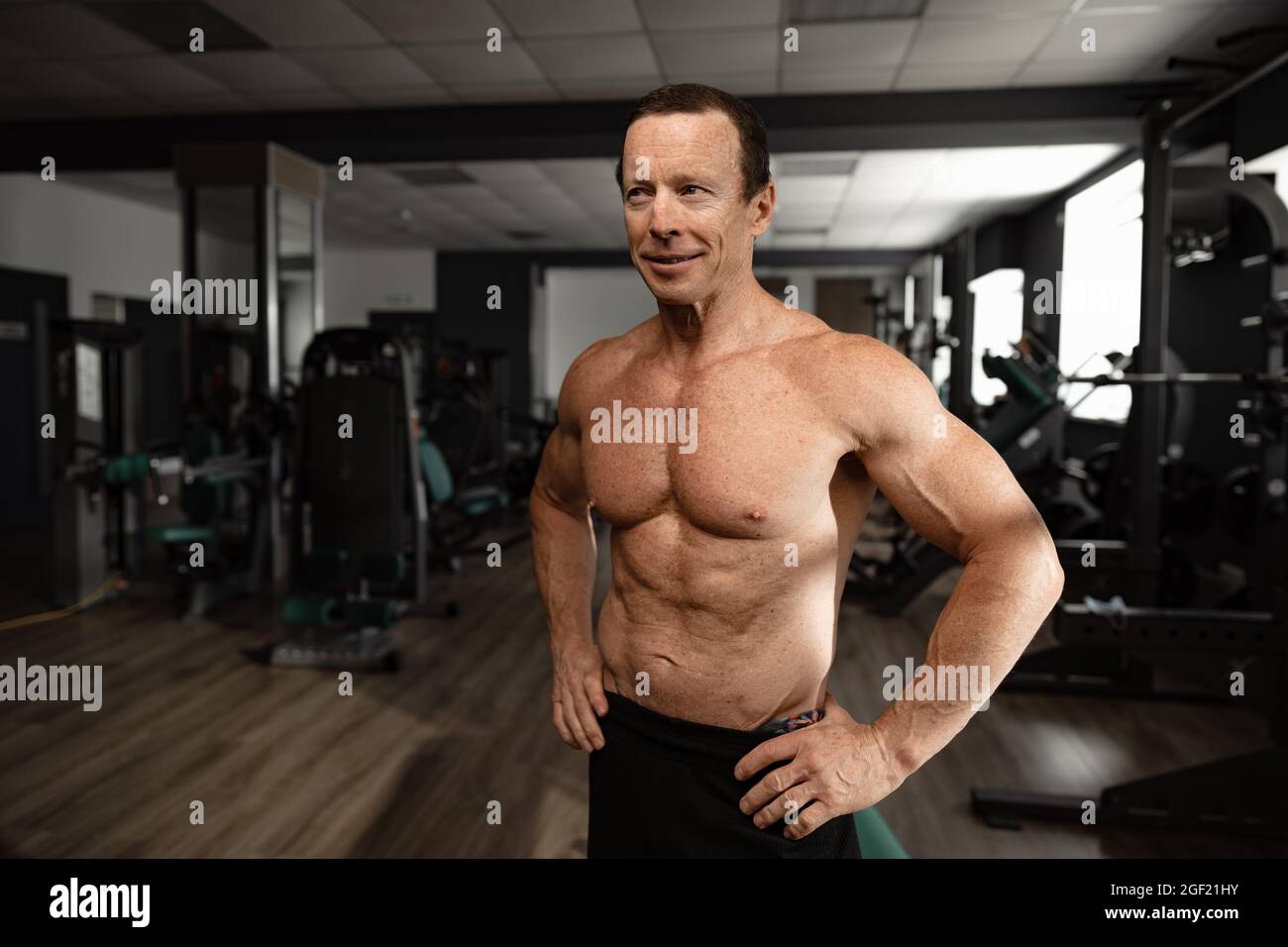 Portrait of a senior muscular man in a gym Stock Photo - Alamy