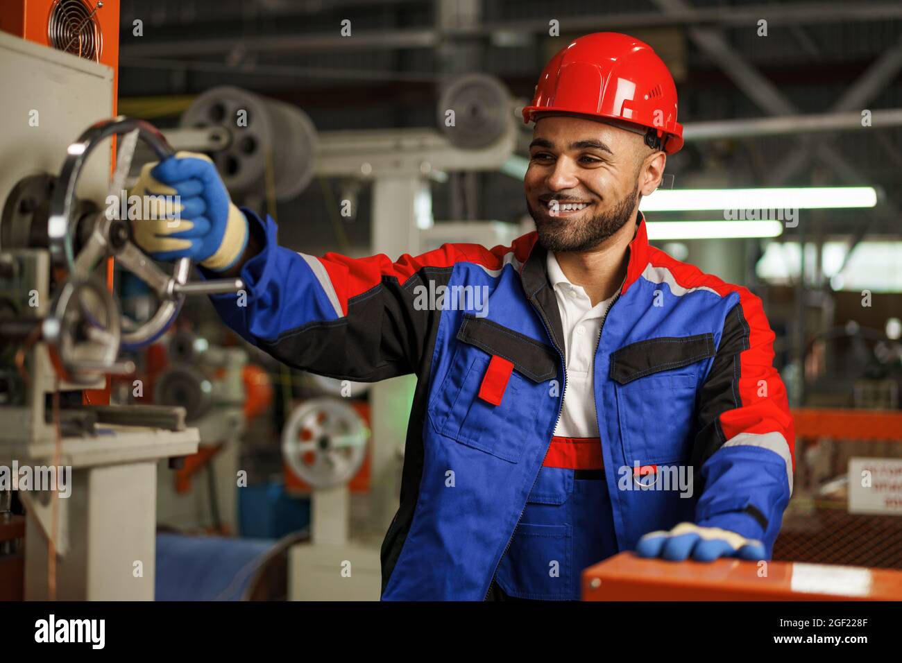 Portrait of a smiling handsome african american factory worker Stock ...