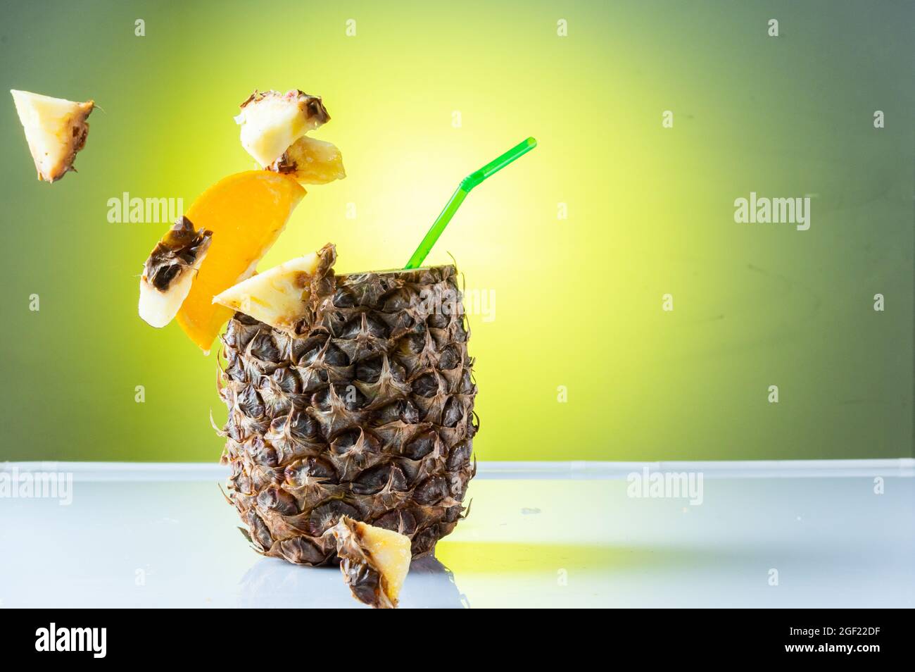 Flying pineapple slices. Pineapple slices in the air. Pineapple ...