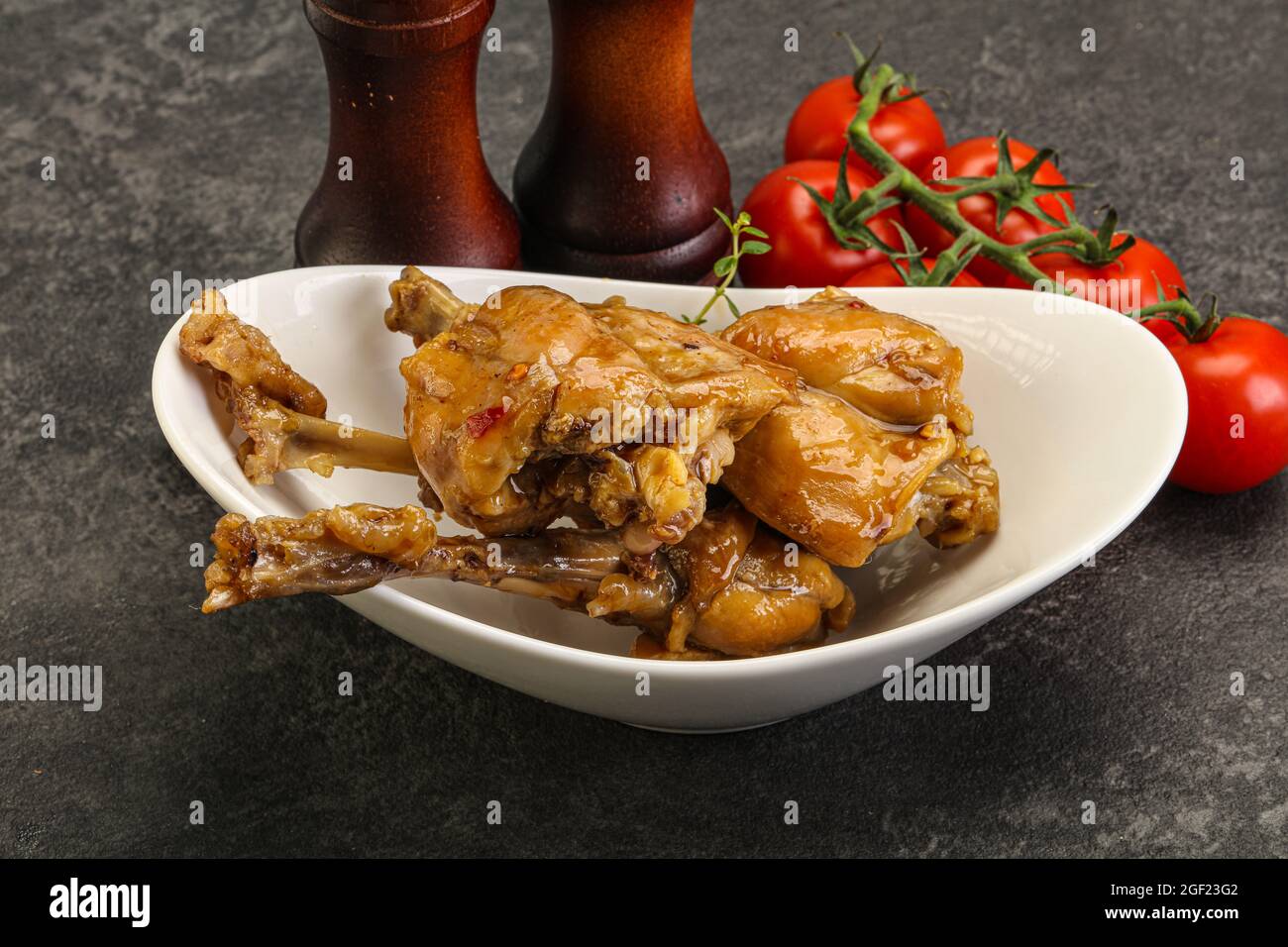 Rabbit stew in sweet and spicy sauce Stock Photo - Alamy