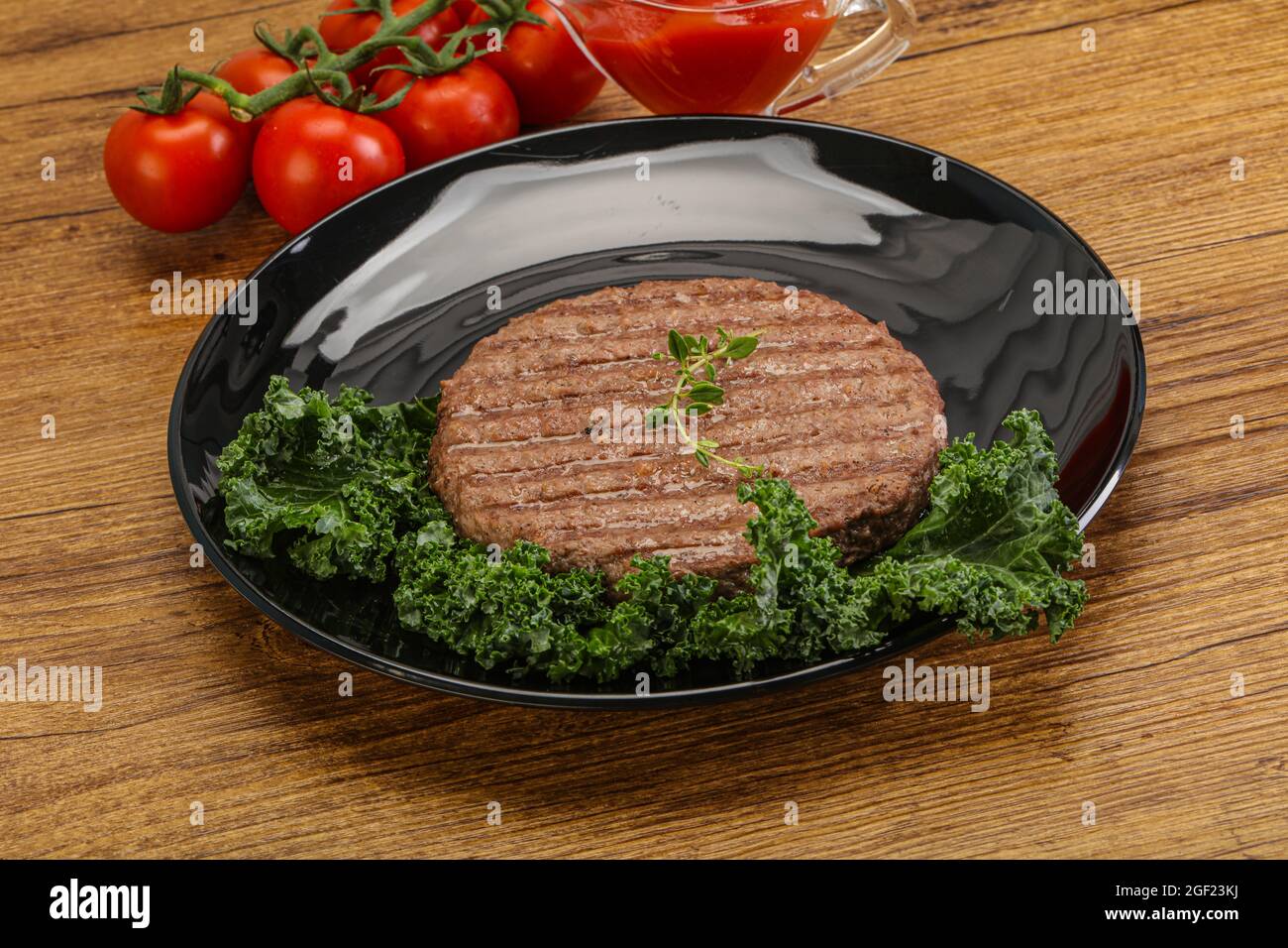 Grilled tasty beef cutlet for burger Stock Photo - Alamy