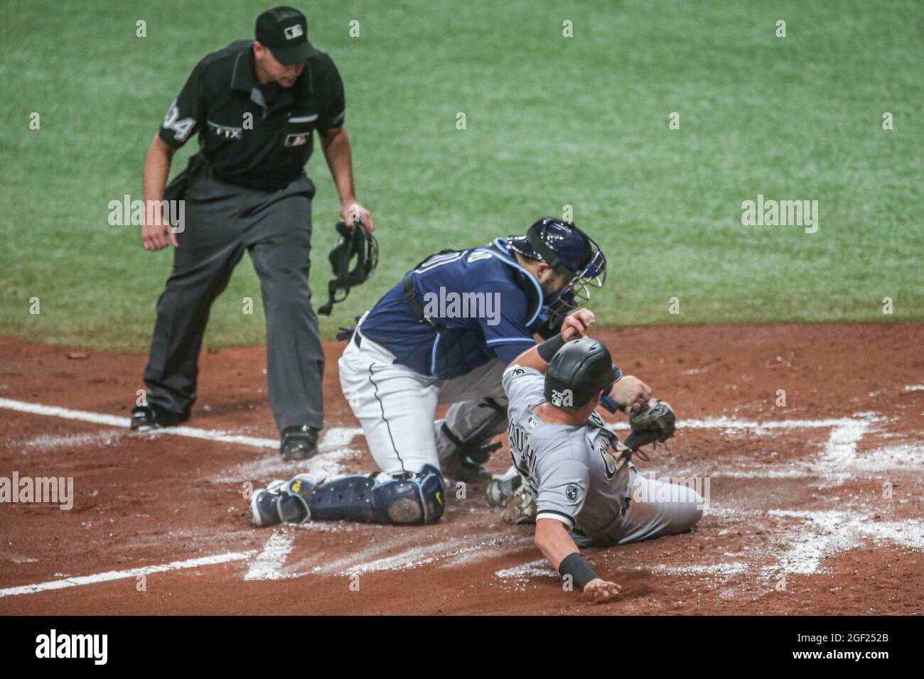 St. Petersburg, FL. USA; Tampa Bay Rays catcher Mike Zunino (10) tags ...