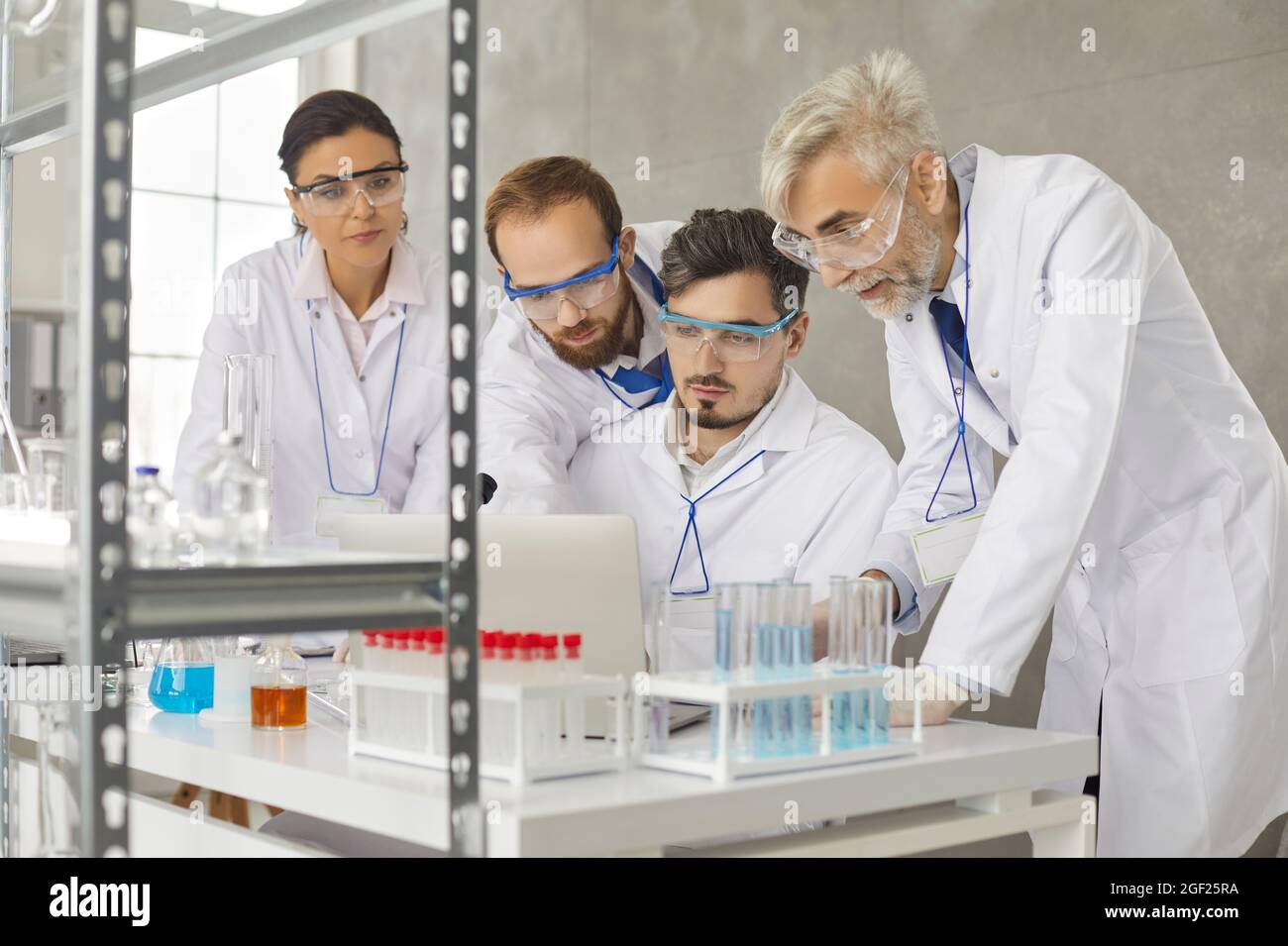 Portrait of a team of scientists working in a modern medical research ...