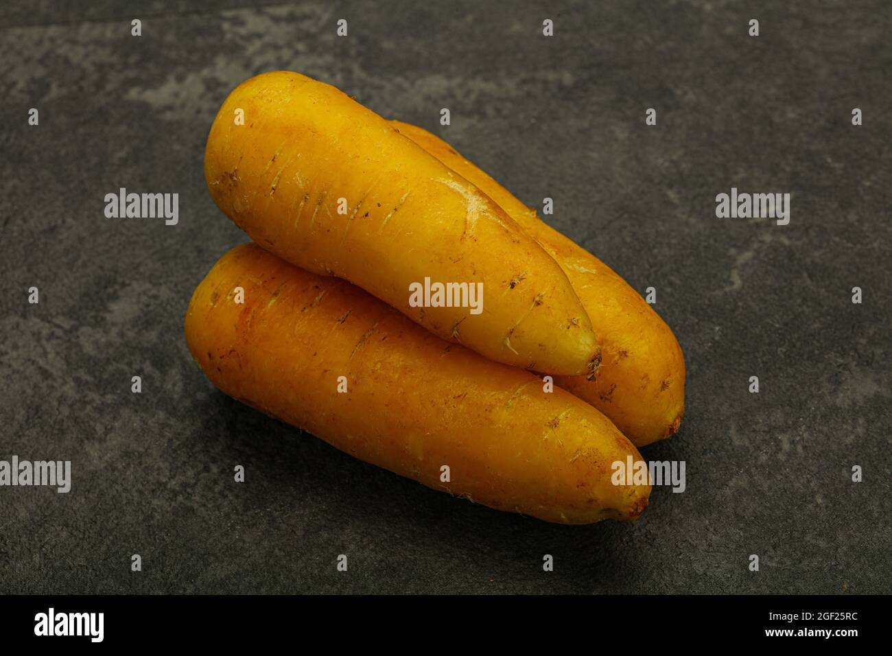 Natural vegan food - Raw Yellow carrot Stock Photo - Alamy