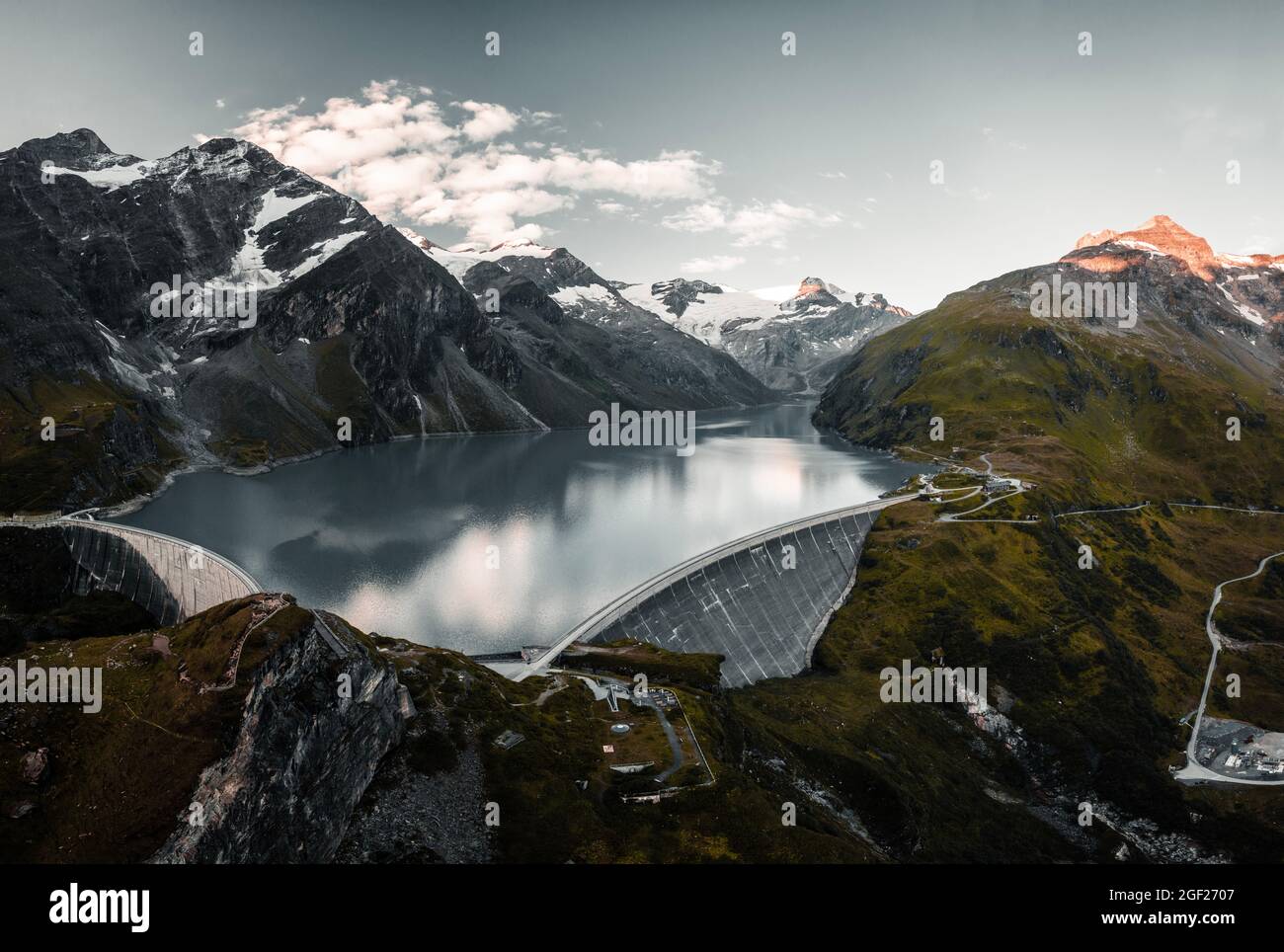 Water reservoir in the austrian mountains Stock Photo - Alamy