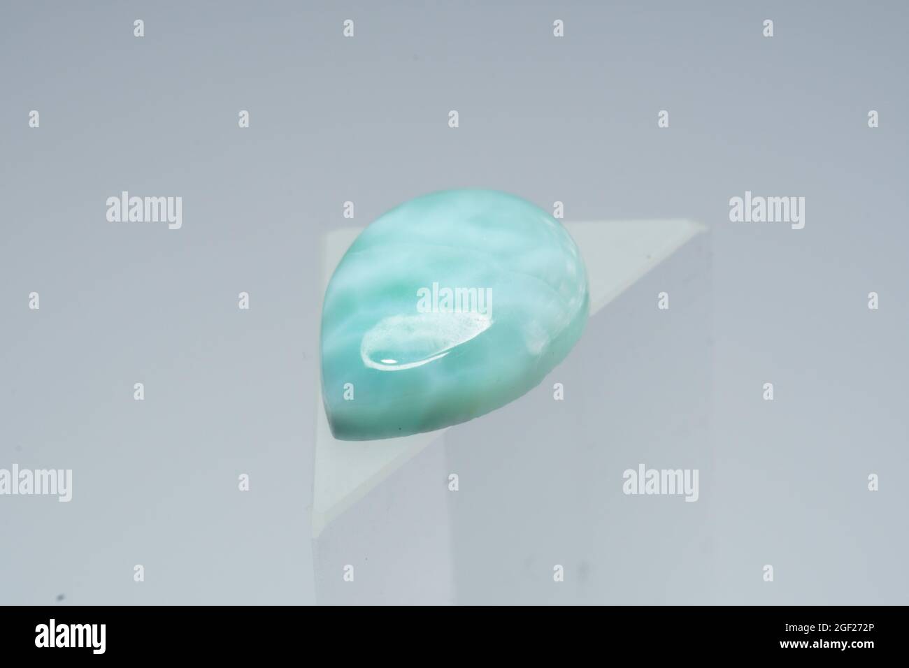 Natural larimar stone on white background Stock Photo - Alamy
