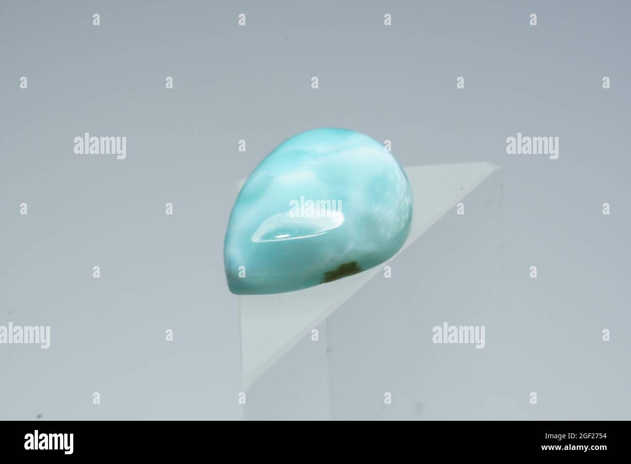 Natural larimar stone on white background Stock Photo - Alamy