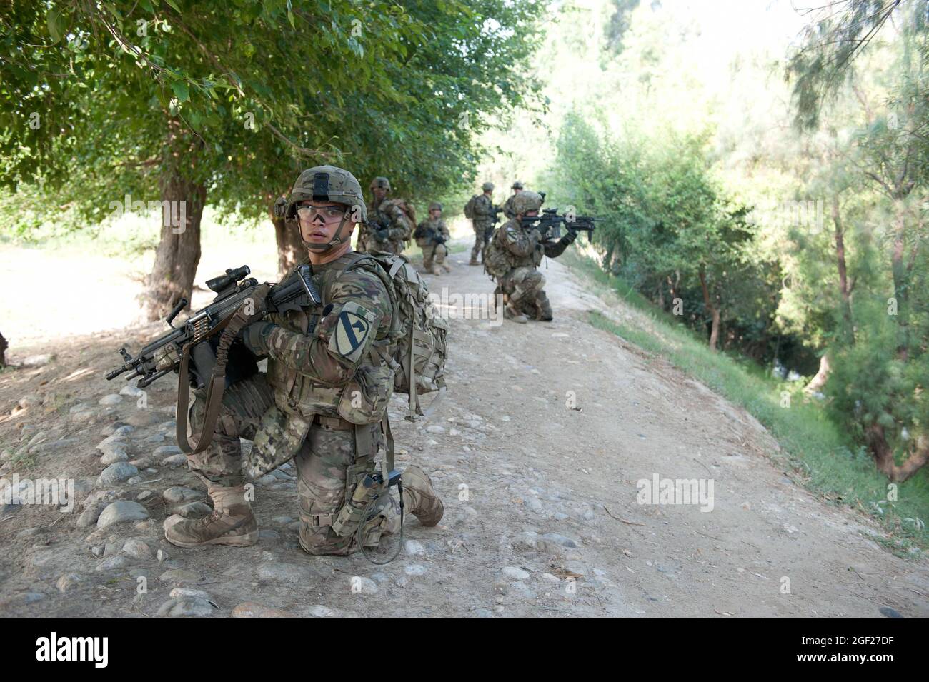 U.S. Army Pfc. Shaun Innocenti, an M249 light machine gunner assigned ...