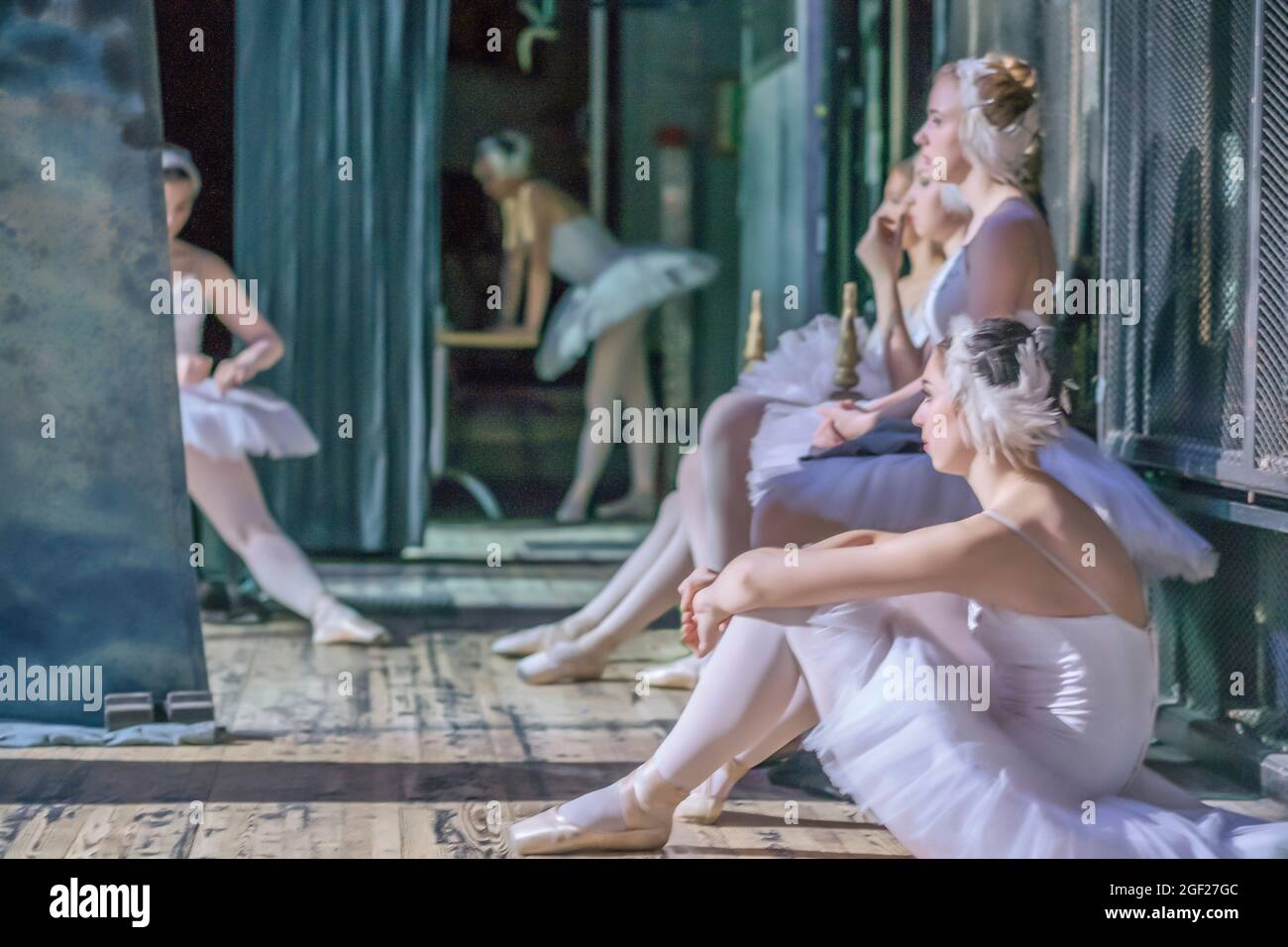 Six ballerinas from the corps de ballet wait for their entrance cue ...