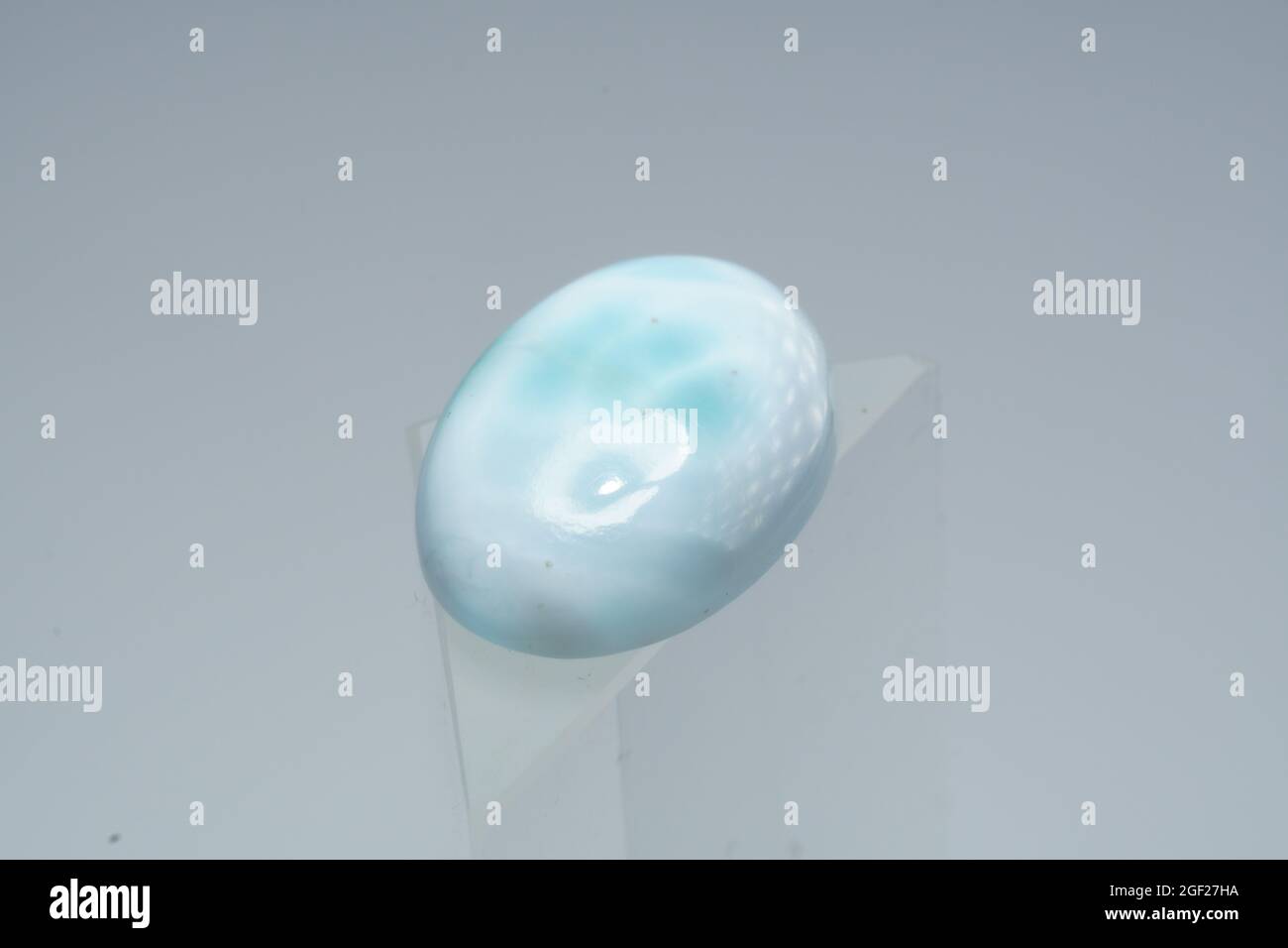 Natural larimar stone on white background Stock Photo - Alamy