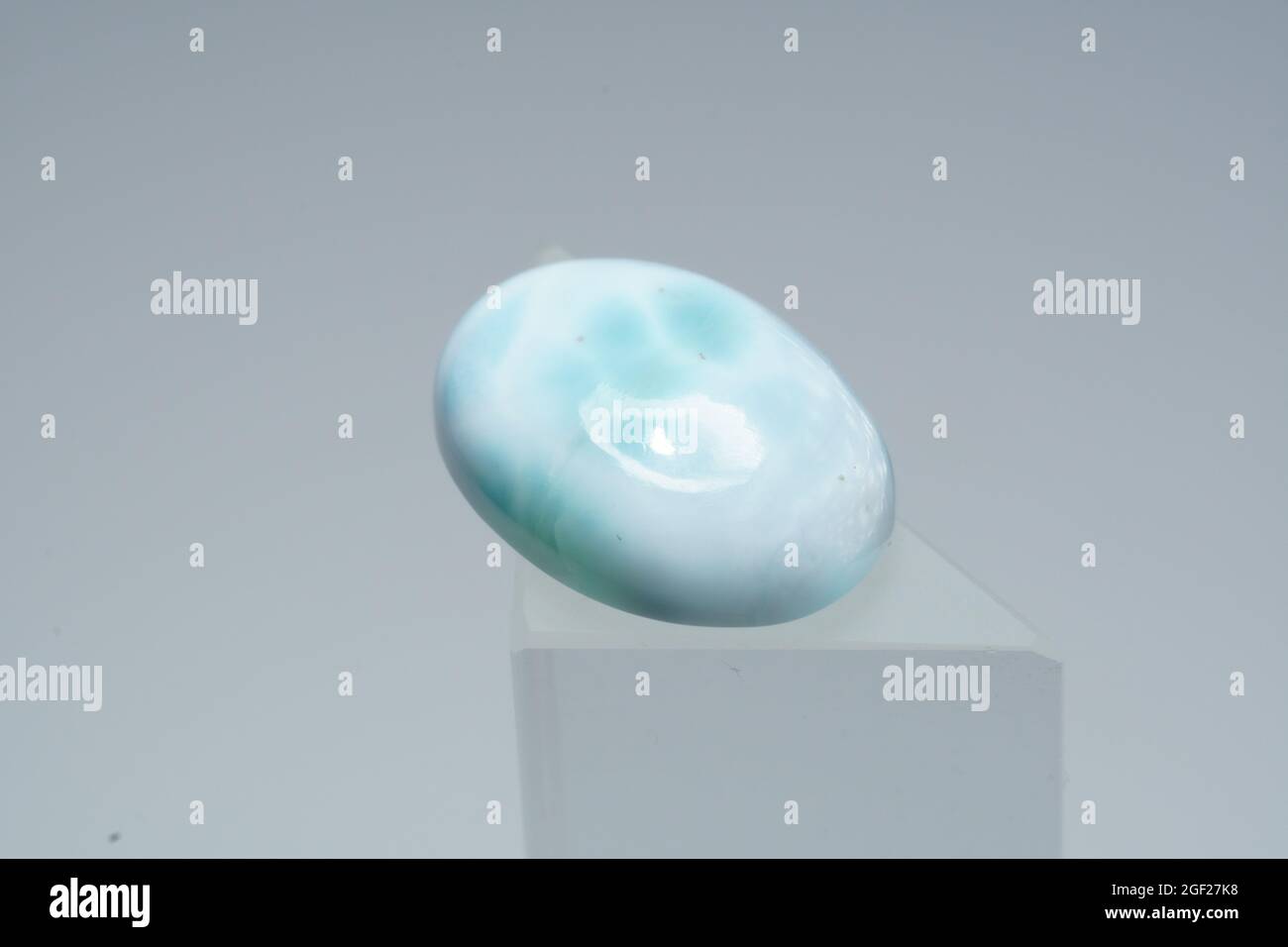 Natural larimar stone on white background Stock Photo - Alamy