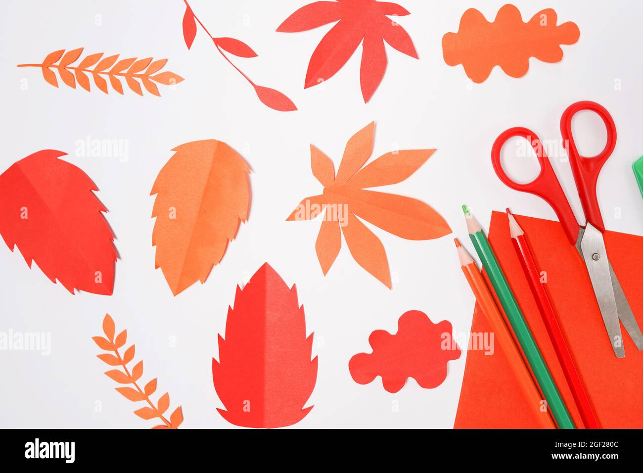 red, orange paper autumn Leaves on white background. Handmade origami ...
