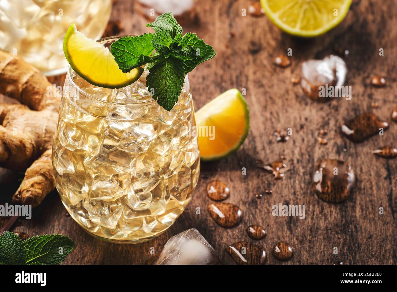 Classic Ginger Ale Cocktails with Beer, Lime, Lemon and Mint Leaves in ...