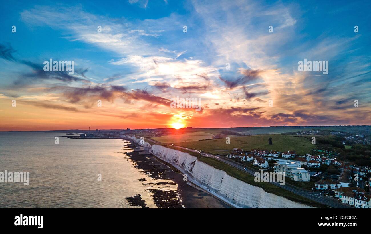 Aerial view of sunset by the Brighton with view of cliffs Stock Photo ...