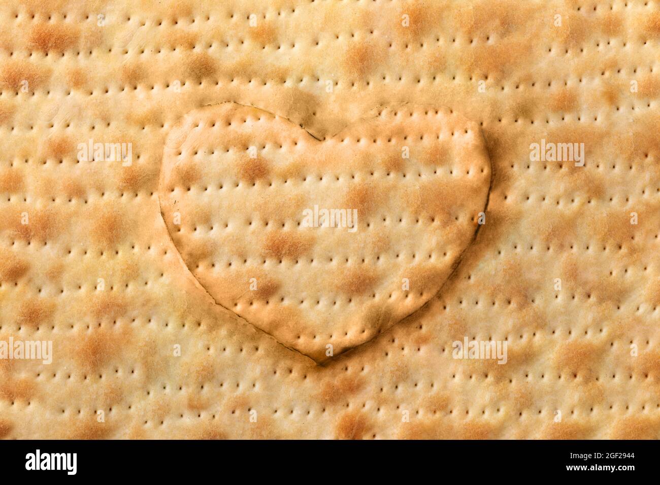Heart shaped matza bread background Stock Photo - Alamy