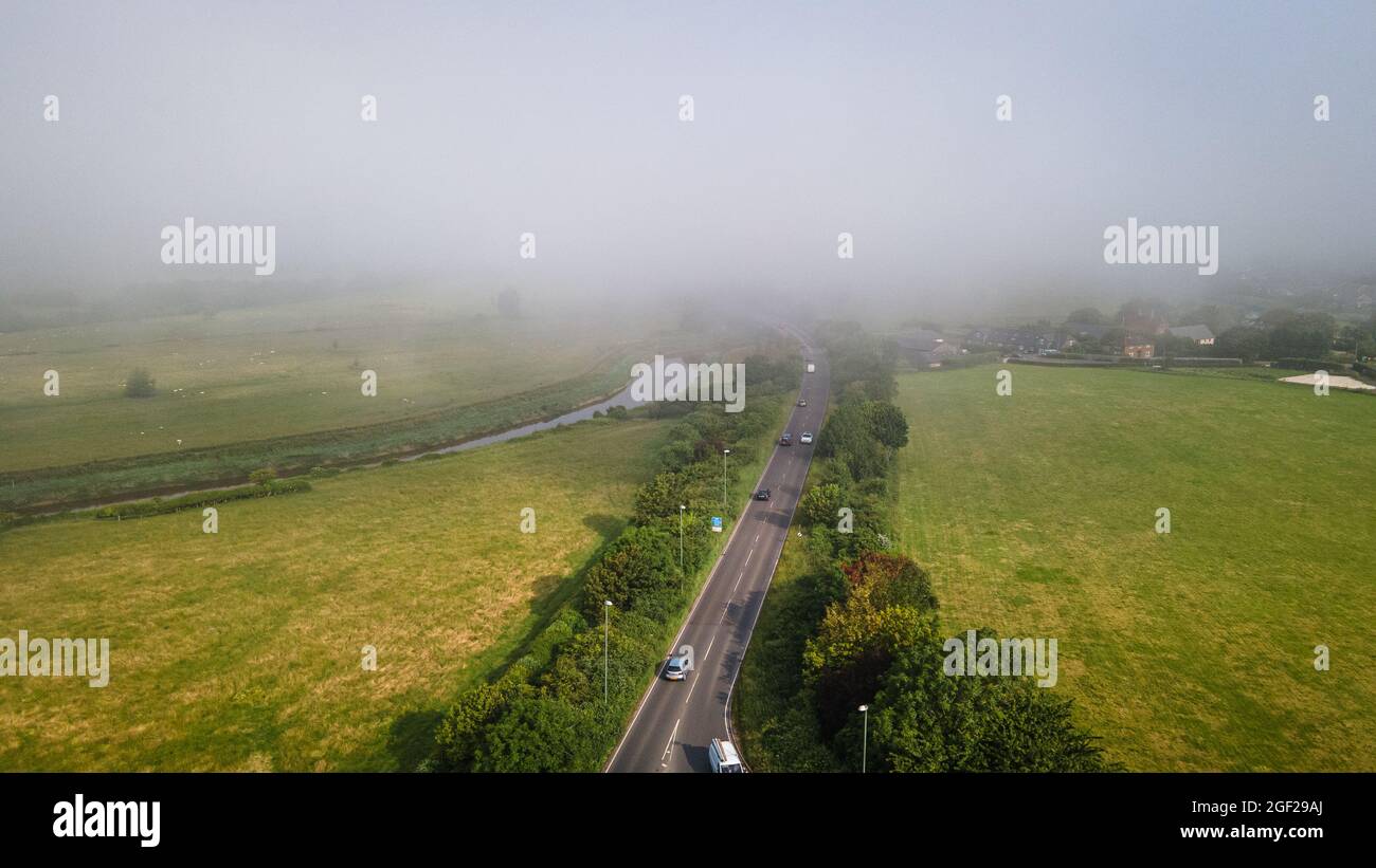 Low mist over road hi-res stock photography and images - Alamy