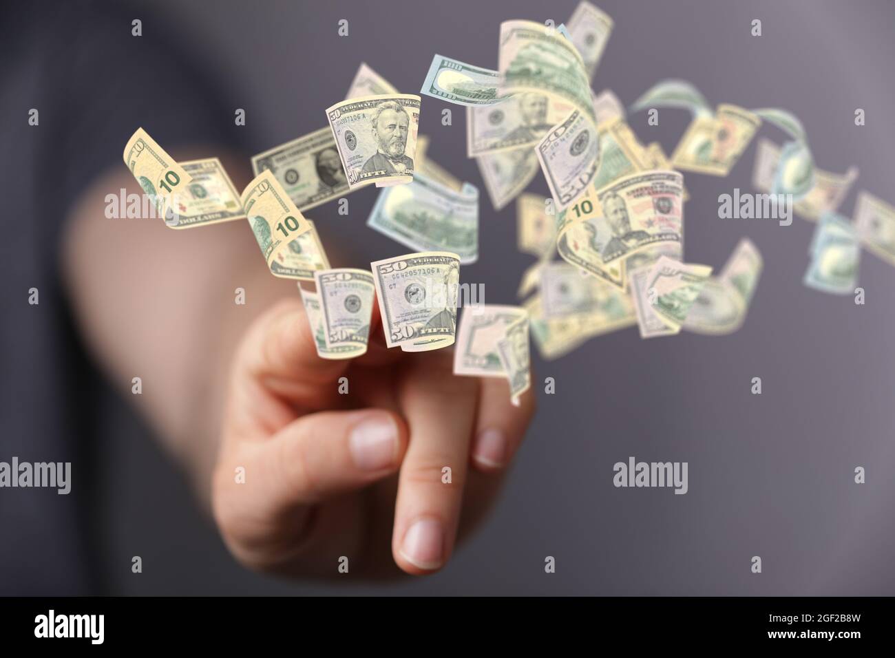 Person pointing to a 3D render of floating dollar banknotes Stock Photo ...