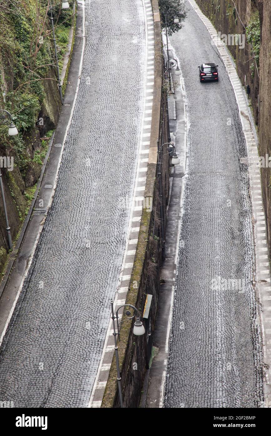 SORRENTO, ITALY - Mar 14, 2018: Two parallel streets with one car in ...