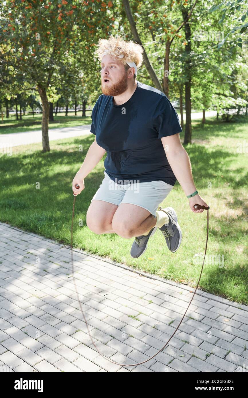 Skipping rope man park hi-res stock photography and images - Alamy