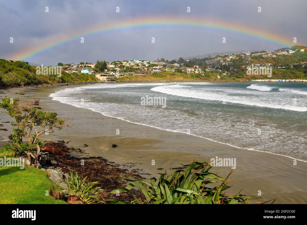 A rainbow over Titahi Bay, a coastal suburb of the city of Porirua, New ...