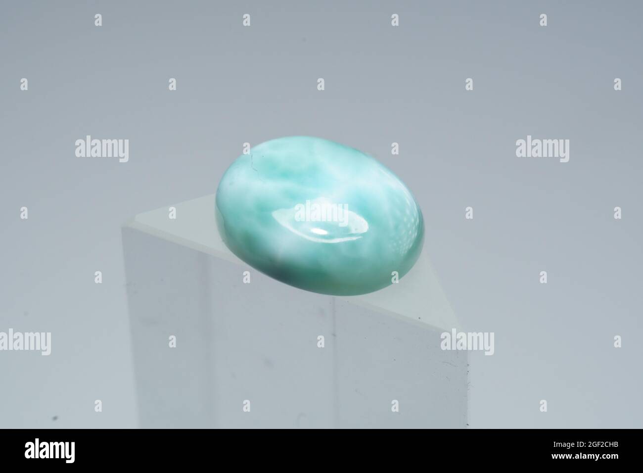 Natural larimar stone on white background Stock Photo - Alamy