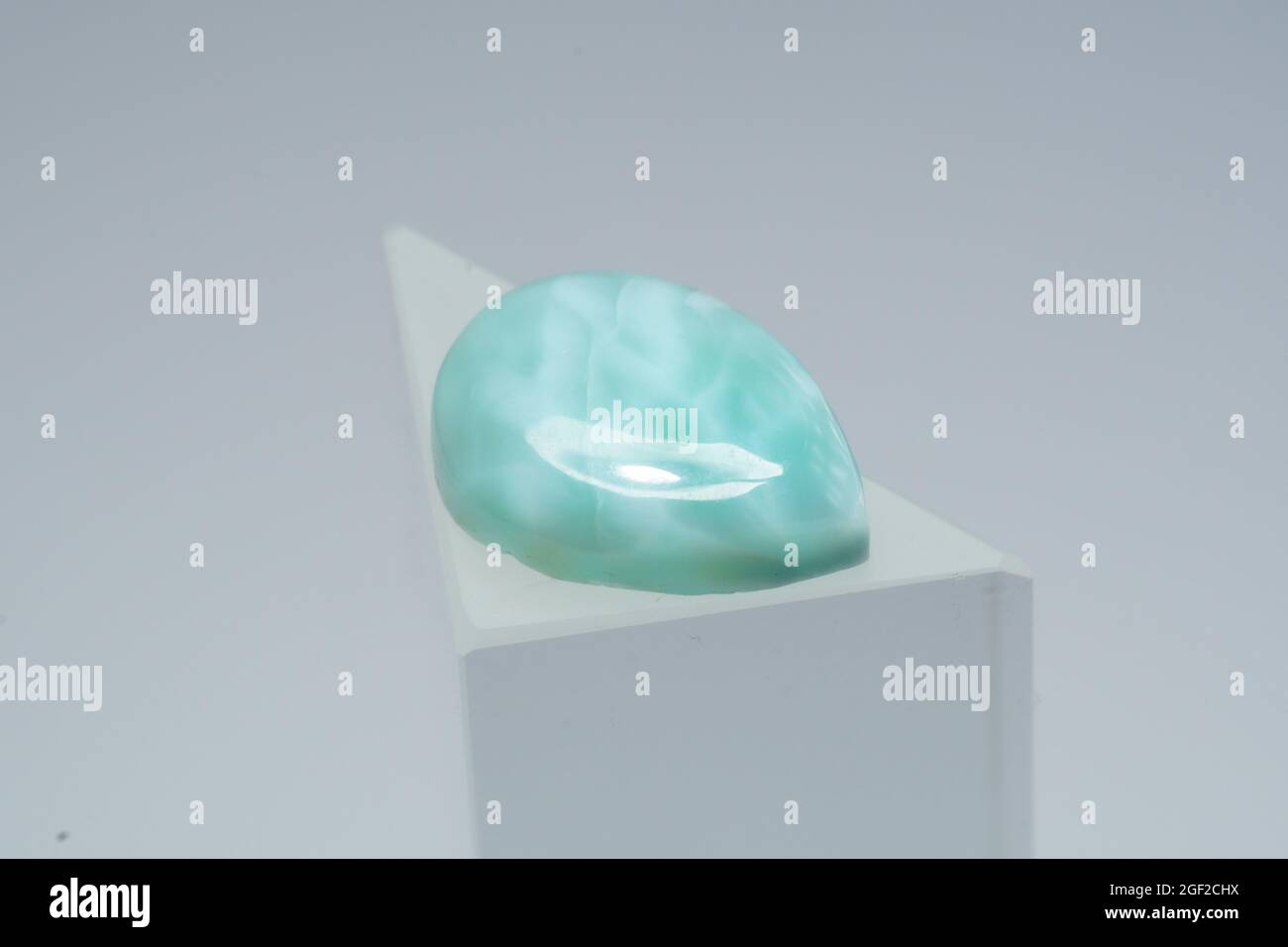 Natural larimar stone on white background Stock Photo - Alamy