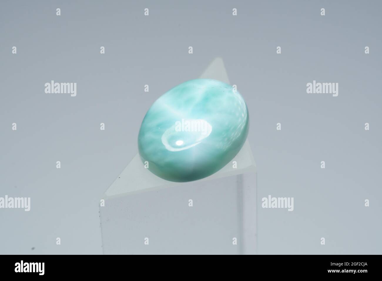 Natural larimar stone on white background Stock Photo - Alamy