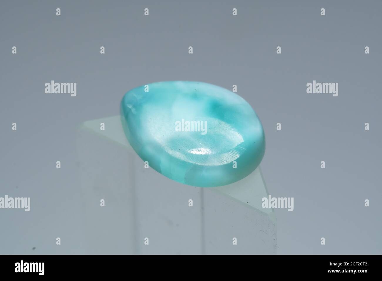 Natural larimar stone on white background Stock Photo - Alamy