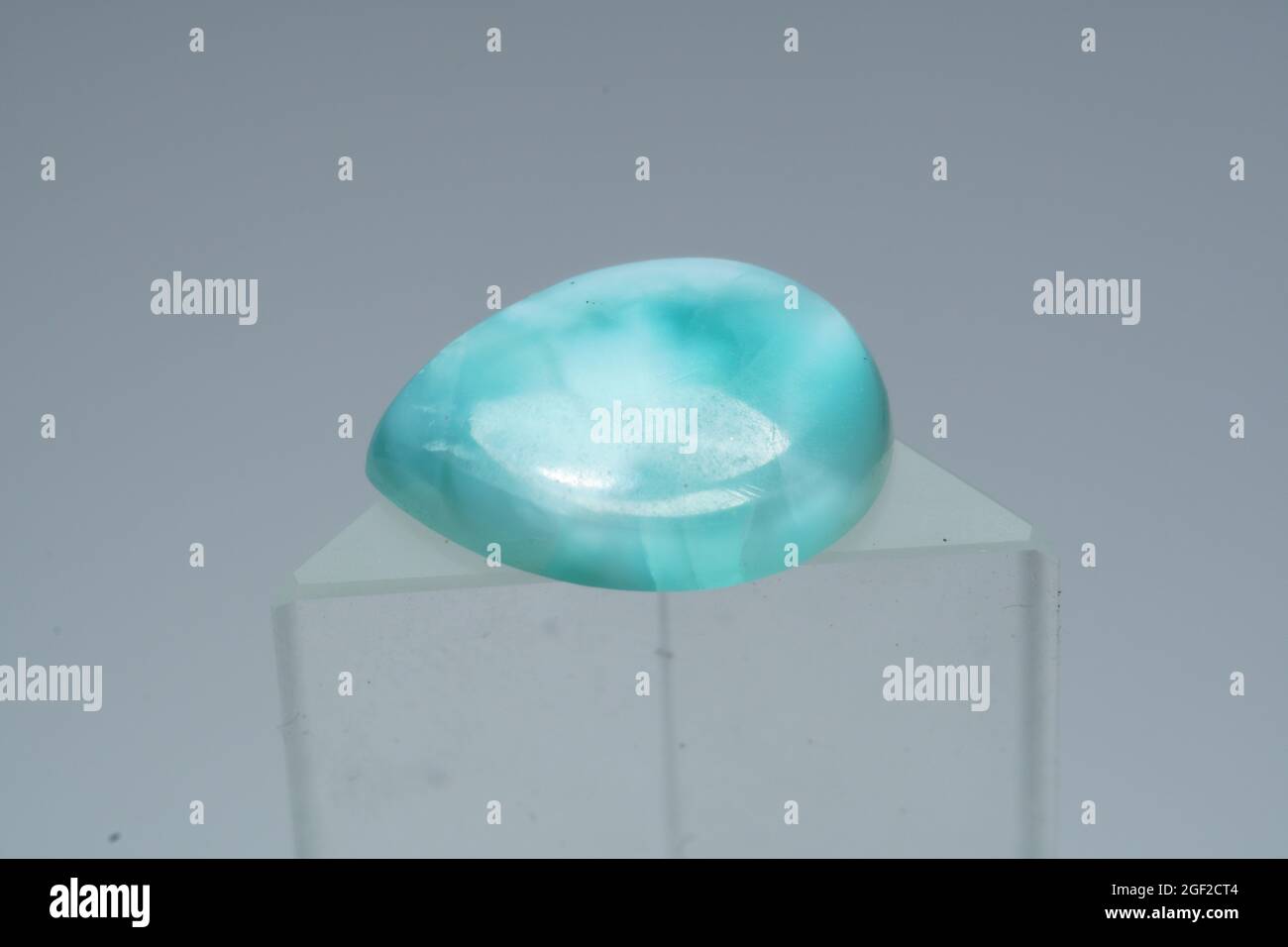 Natural larimar stone on white background Stock Photo - Alamy