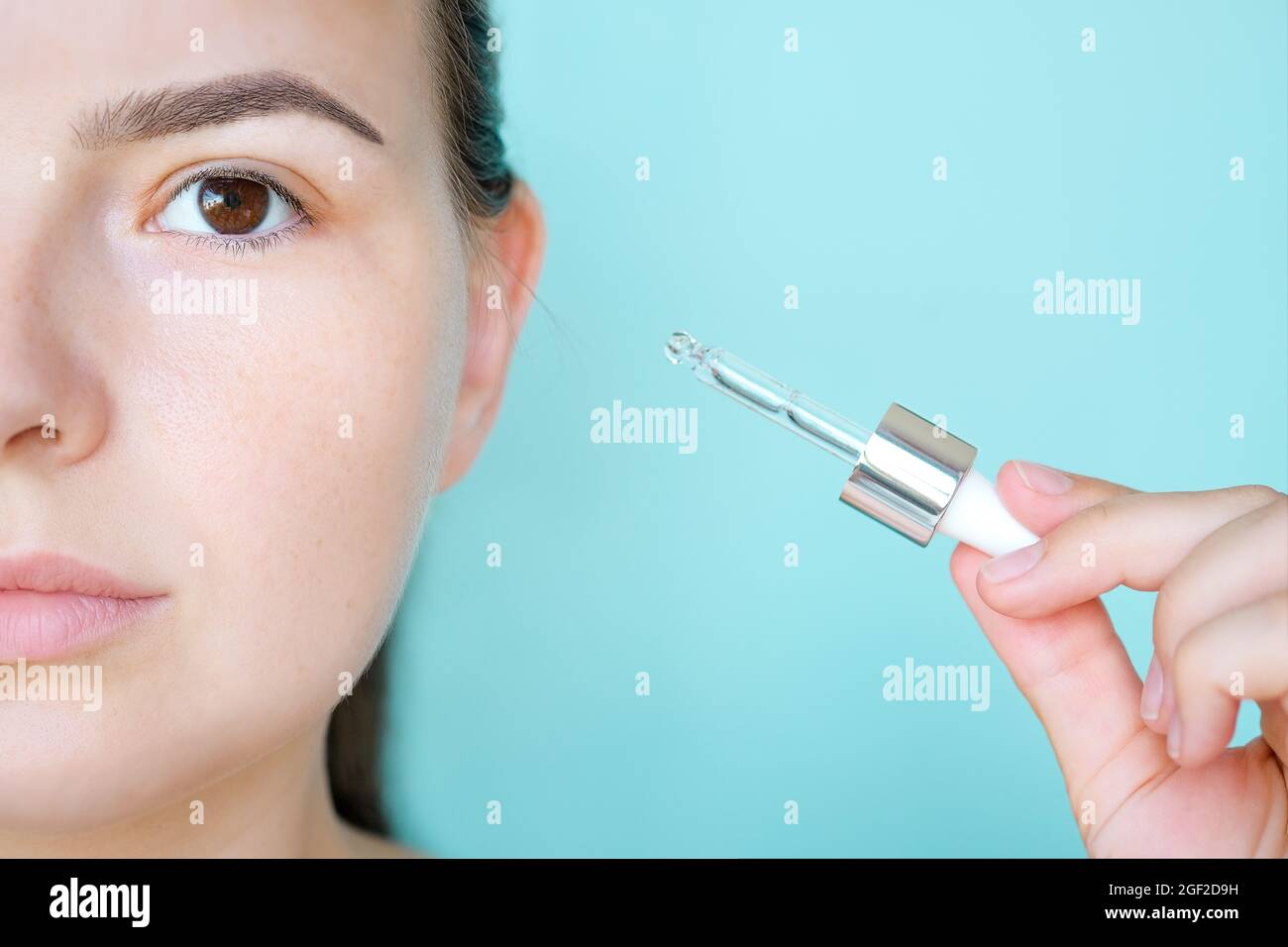 Woman serum face applying hi-res stock photography and images - Alamy